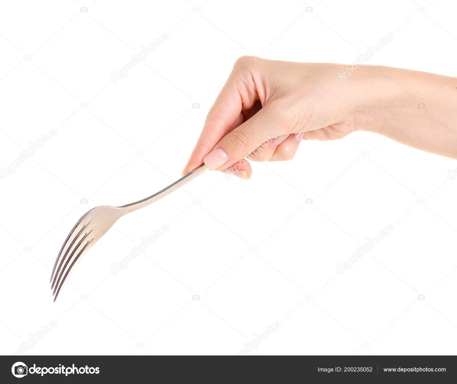 Fork in a hand Stock Photo by ©Evgenyjs1 200235052