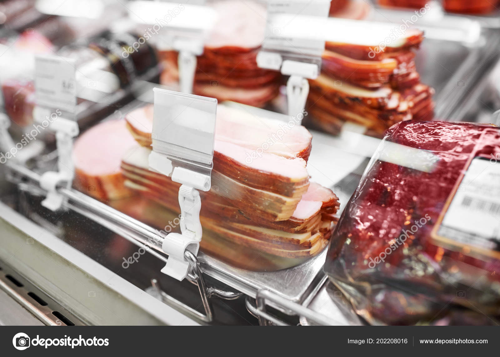 Ham at grocery store stall Stock Photo by ©Syda_Productions 202208016