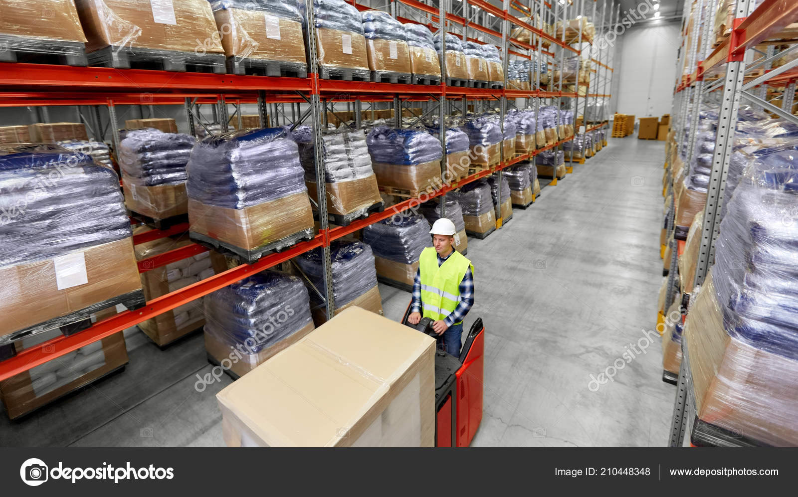 Loader operating forklift at warehouse Stock Photo by ©Syda_Productions ...