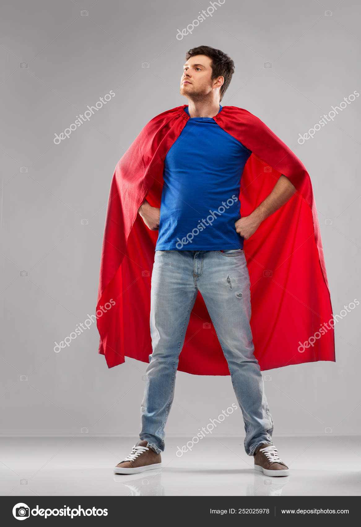 Man in red superhero cape over grey background Stock Photo by ©Syda ...