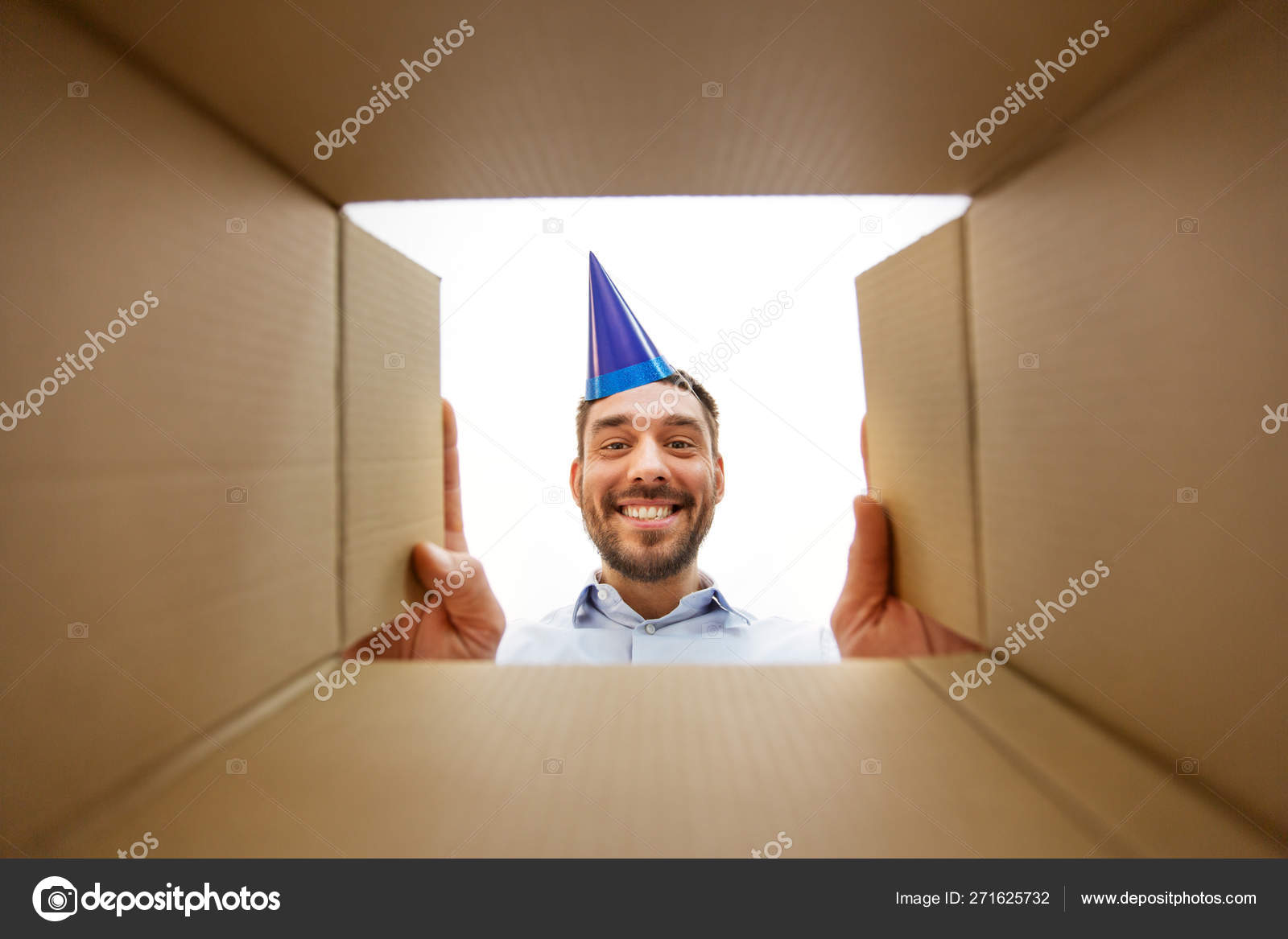 Happy man opening parcel box or birthday gift Stock Photo by ©Syda ...
