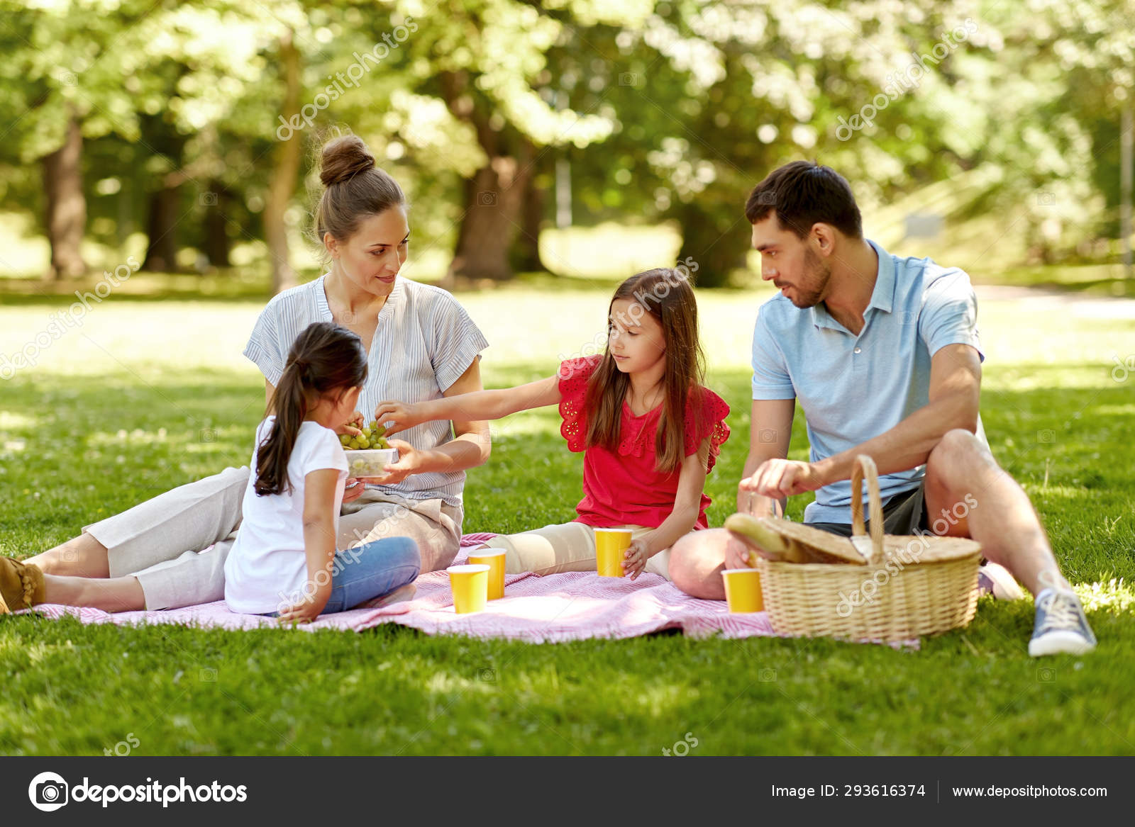 Happy family having picnic at summer park Stock Photo by ©Syda ...