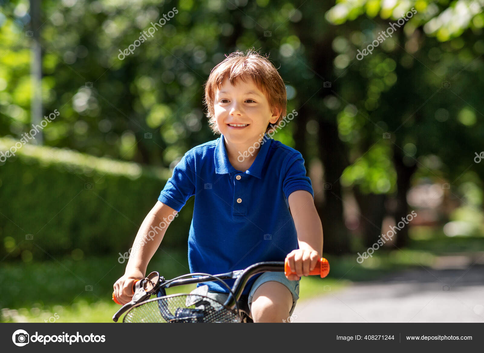 Happy little boy riding bicycle at summer park — Stock Photo © Syda ...