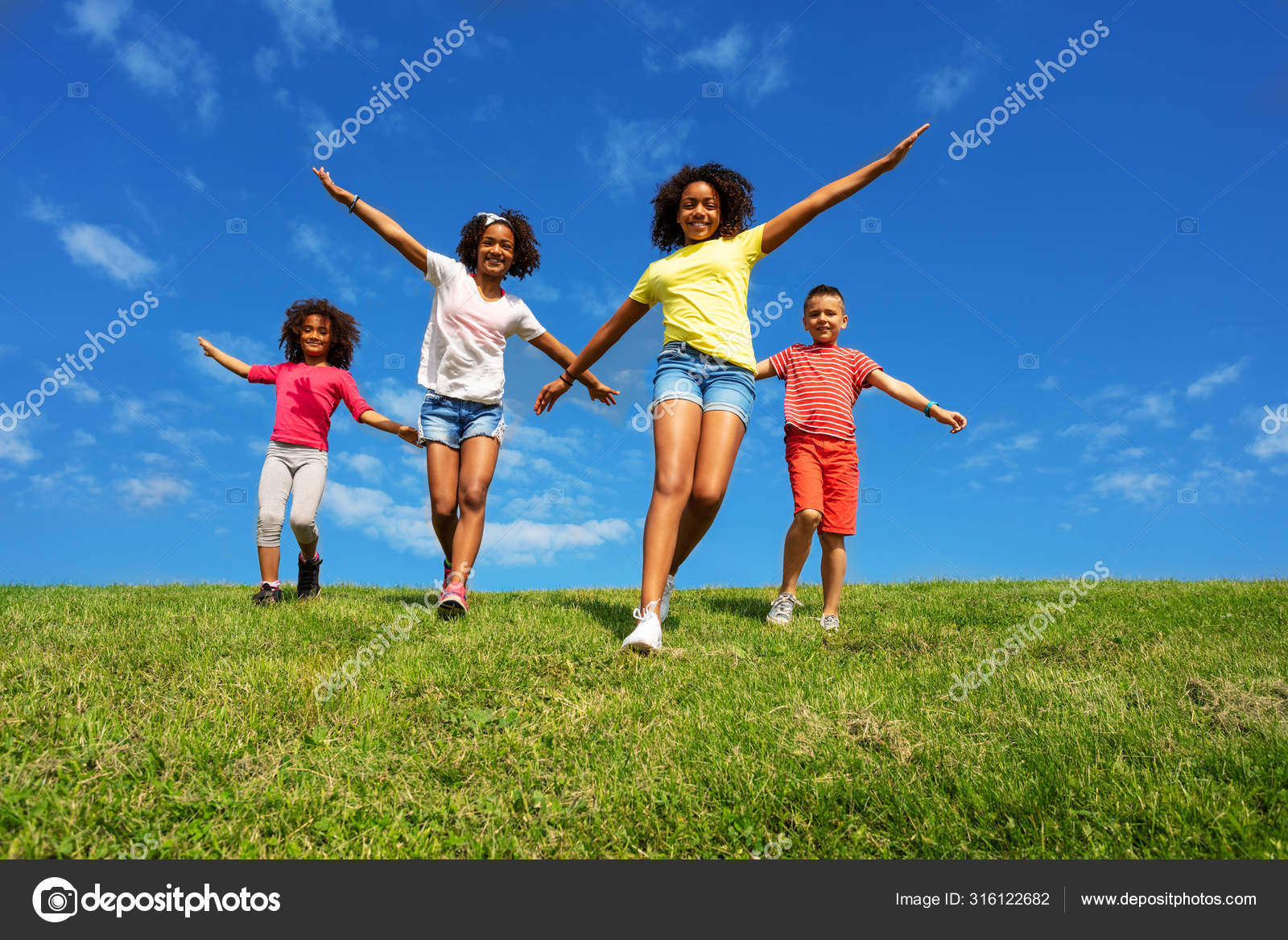 Group Kids Hands Flying Pose Run Grass Field Sky Stock Photo by ...