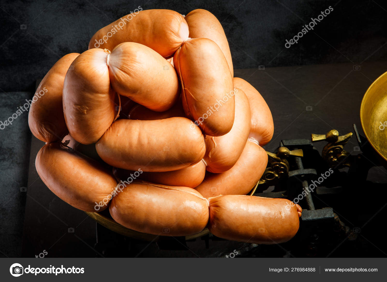 Closeup set of short thick wieners rolled in spiral on scales — Stock ...