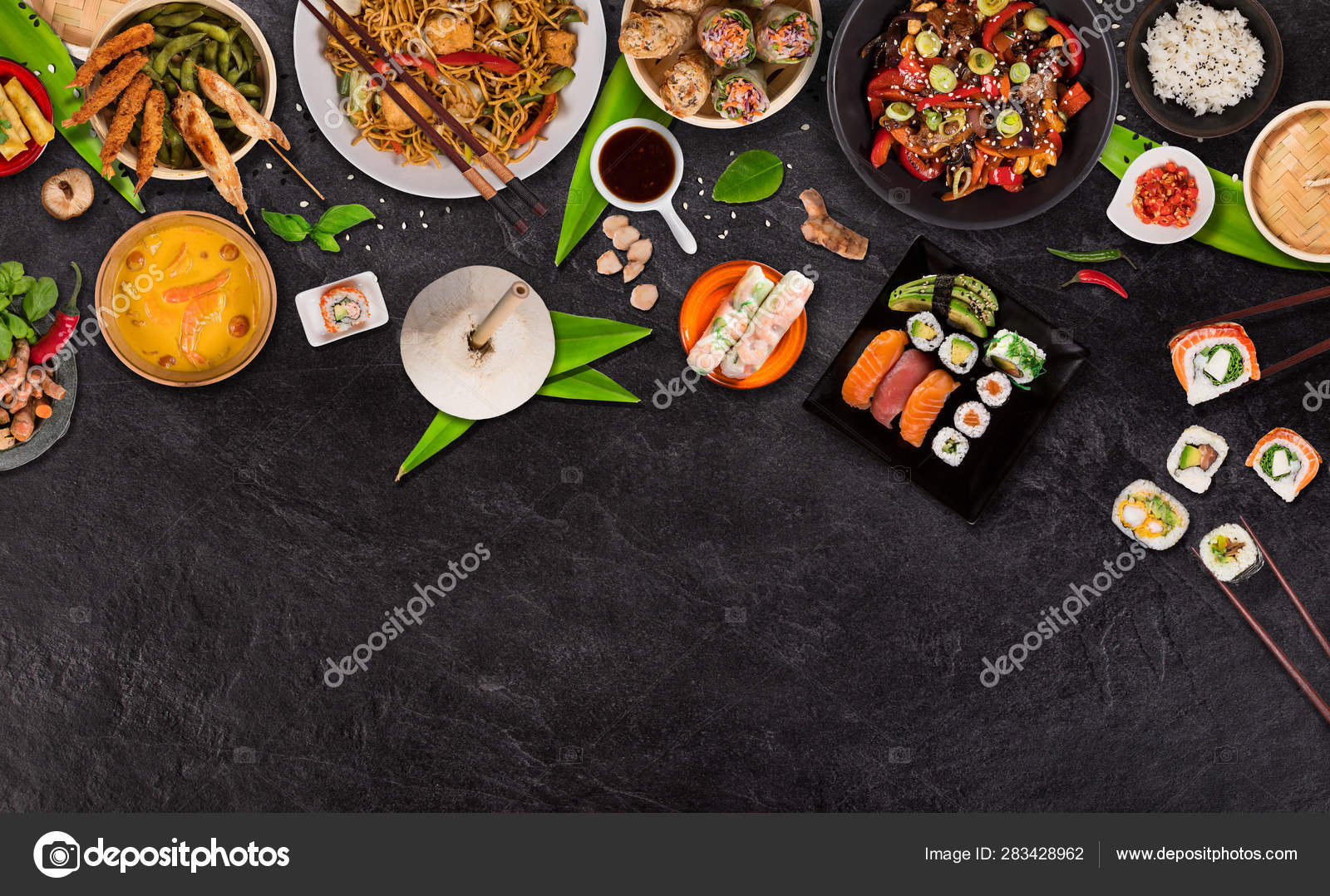 Asian food background with various ingredients on rustic stone ...