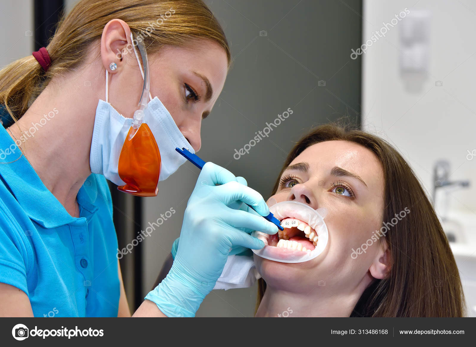Fixing Braces On The Teeth Stock Photo by ©vetkit 313486168