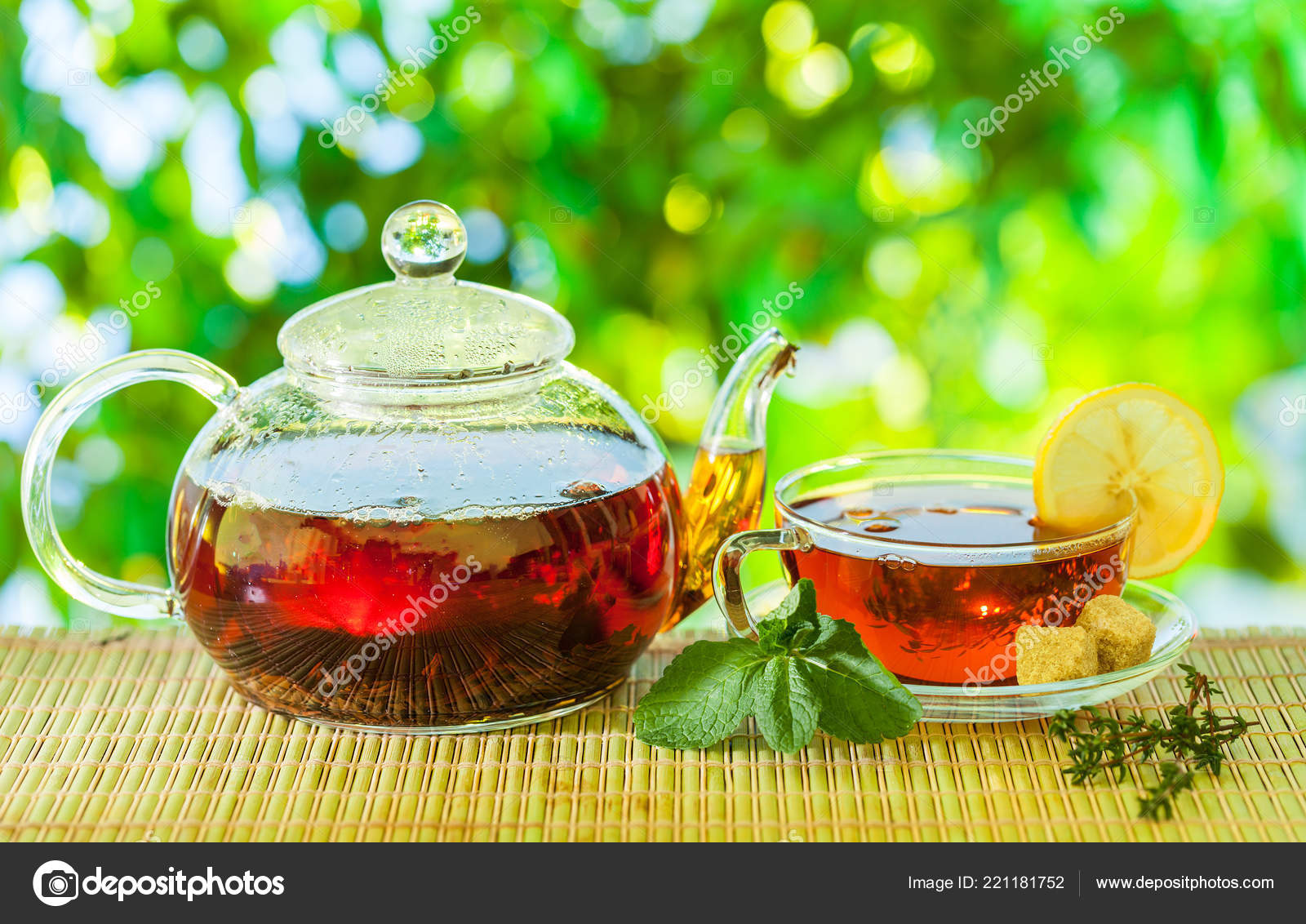 Tea Time Pouring Out Hot Tea Cup Green Nature Background Stock Photo by ...