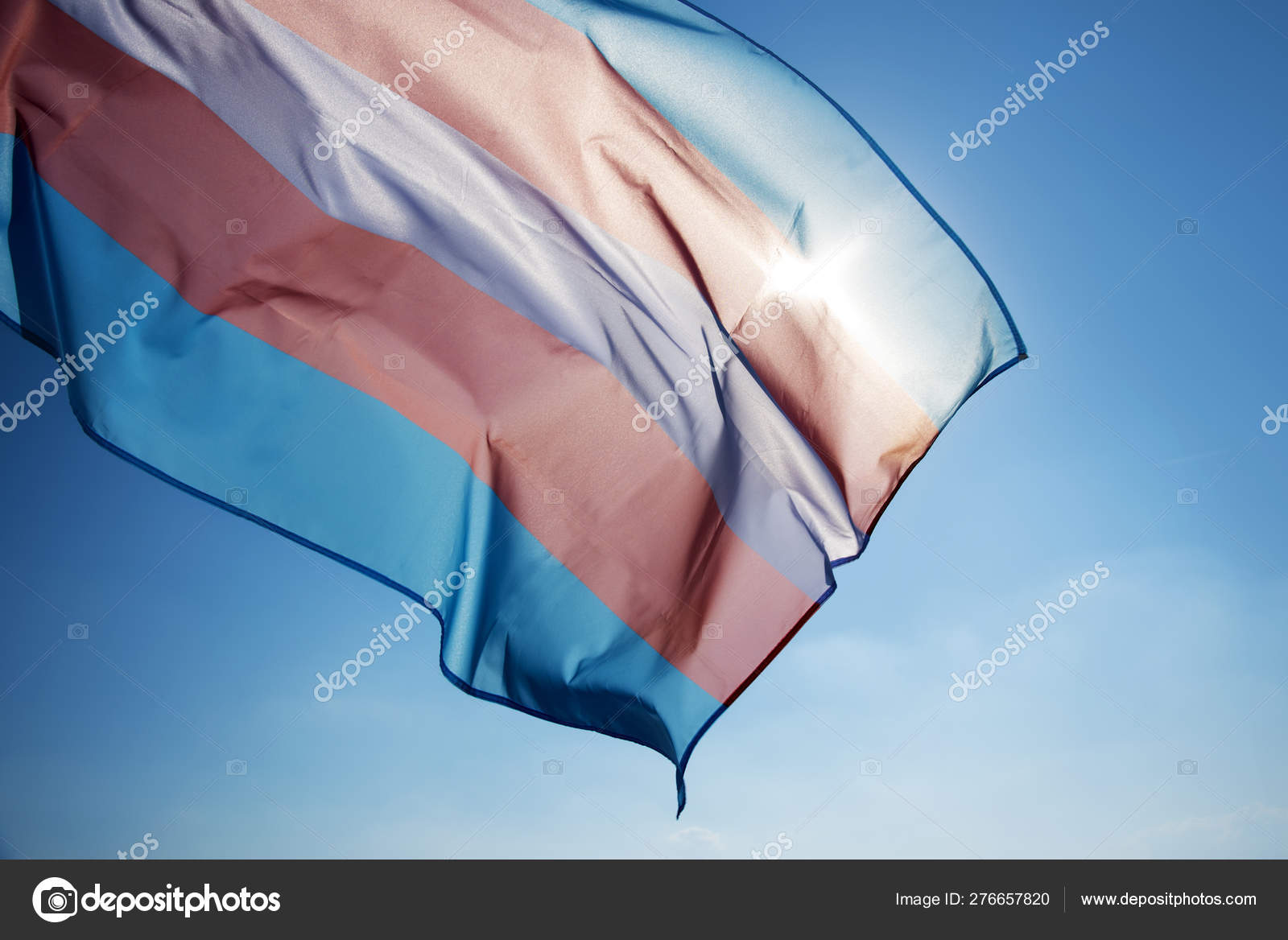 Transgender pride flag waving on the blue sky Stock Photo by ©nito103 ...