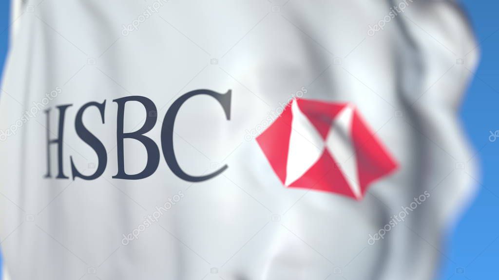 Bandera ondeando con el logotipo de HSBC Holdings plc, de cerca ...