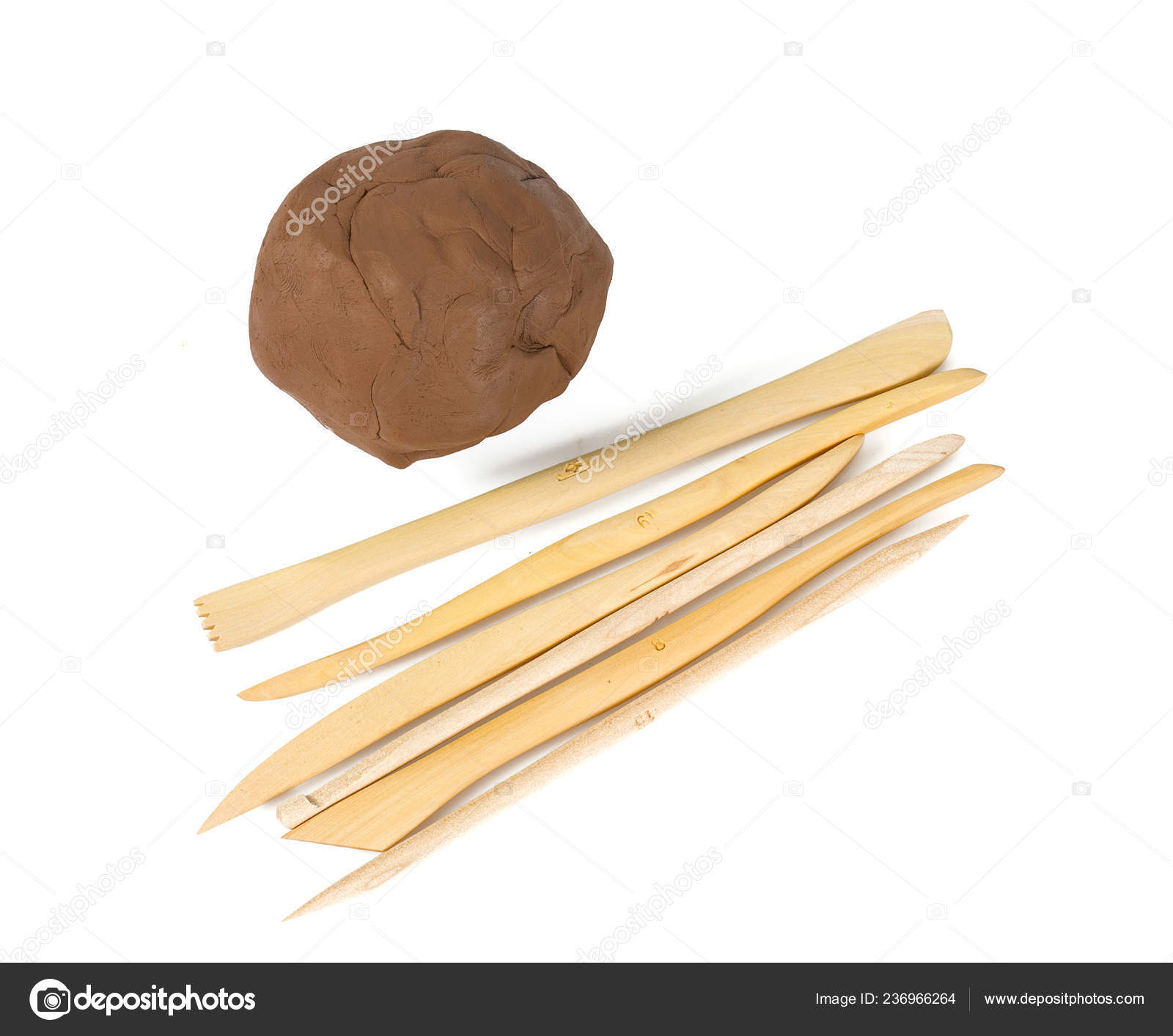 Red Clay Wooden Modeling Tools Stock Photo by ©dianazh 236966264