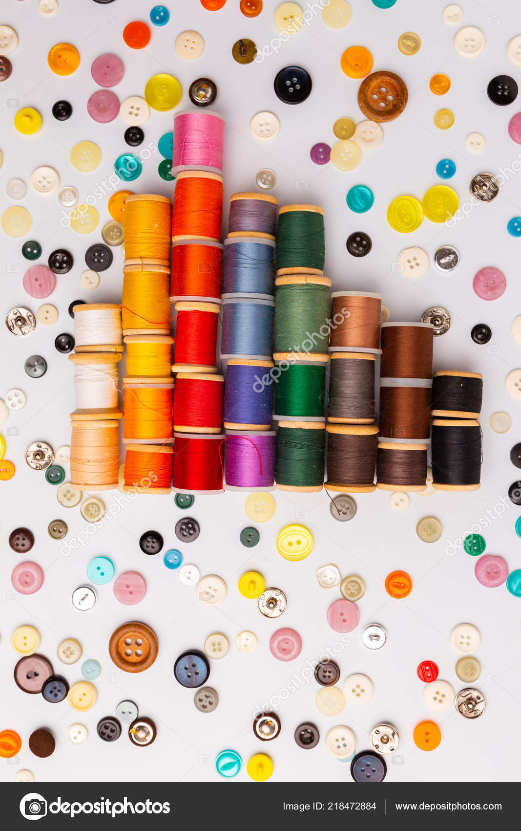 Spool of sewing threads and buttons different colors and types Stock ...