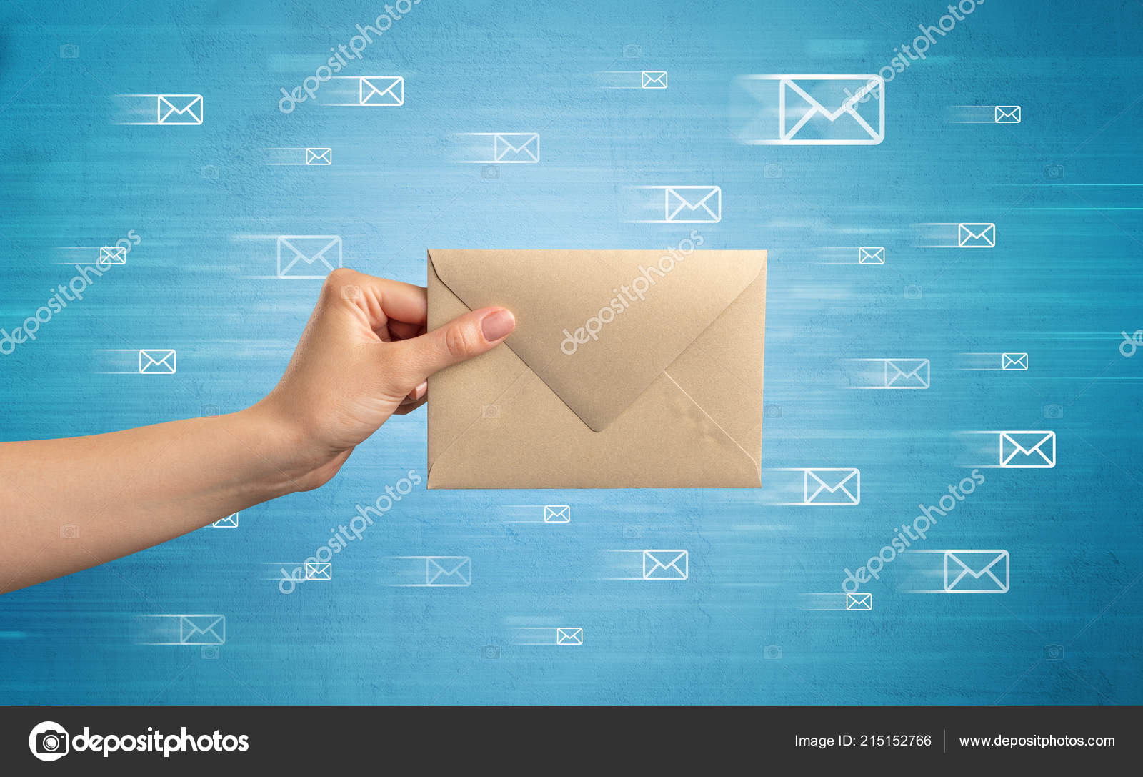 Hand holding envelope with message symbols around Stock Photo by ...