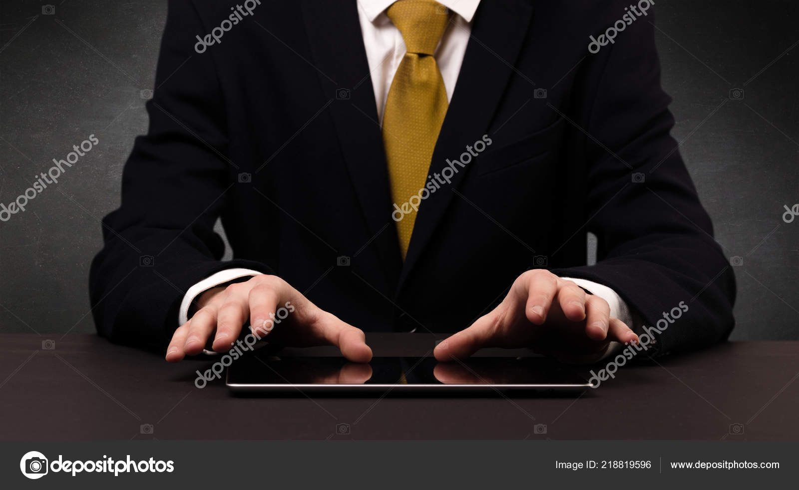 Man typing in formal clothing Stock Photo by ©ra2studio 218819596