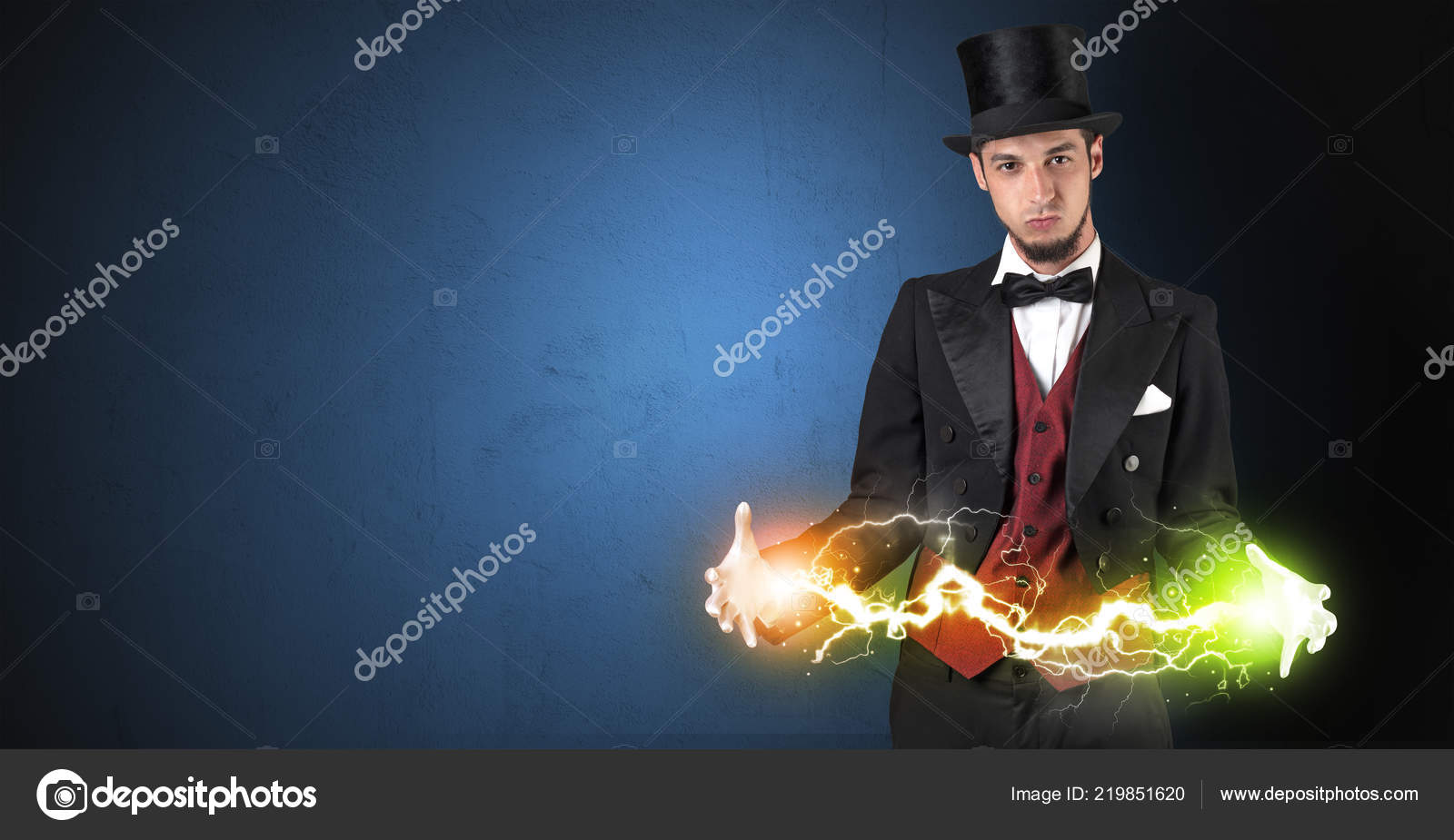 Magician energy between his hands Stock Photo by ©ra2studio 219851620