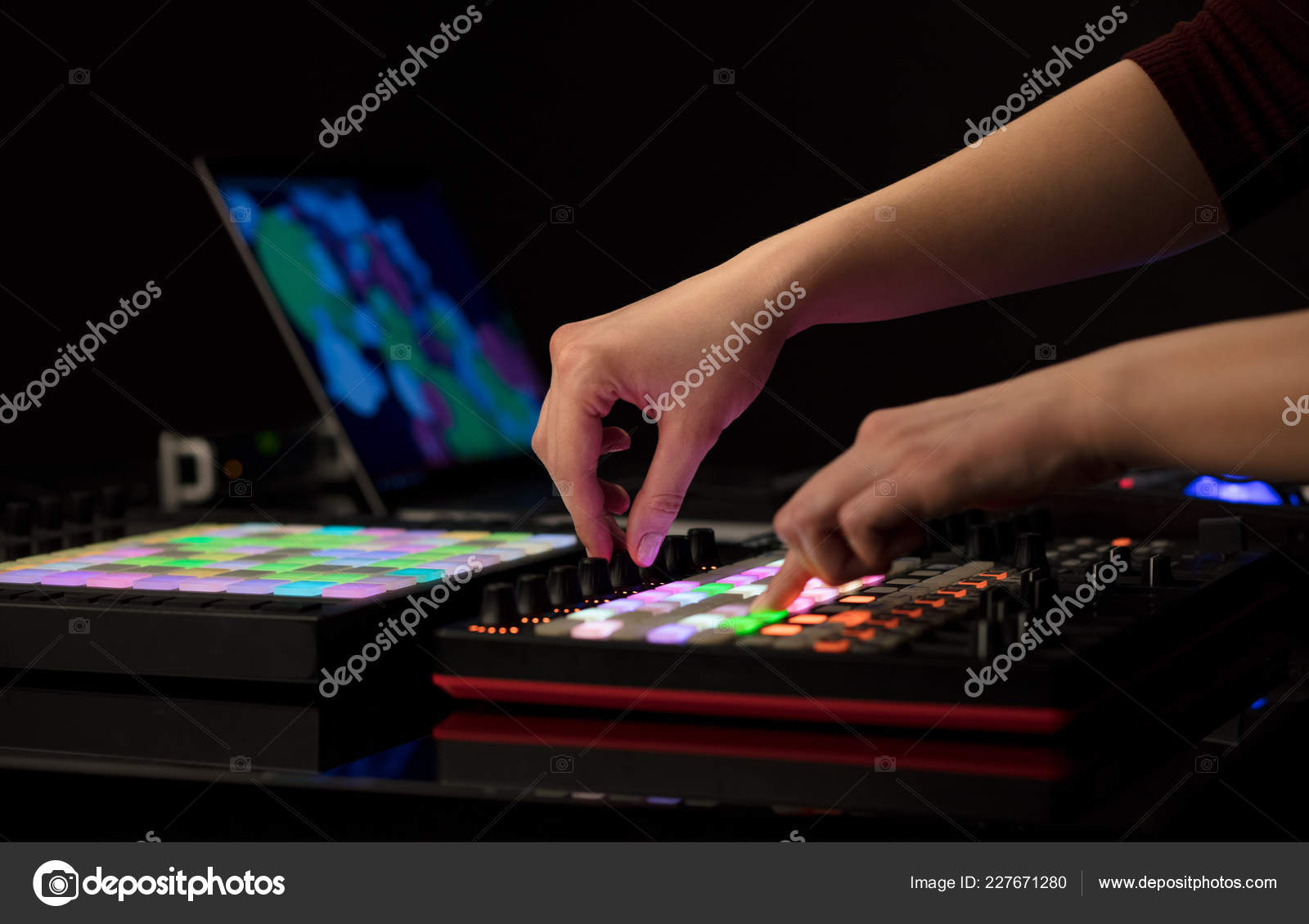 Hand mixing music on midi controller — Stock Photo © ra2studio #227671280