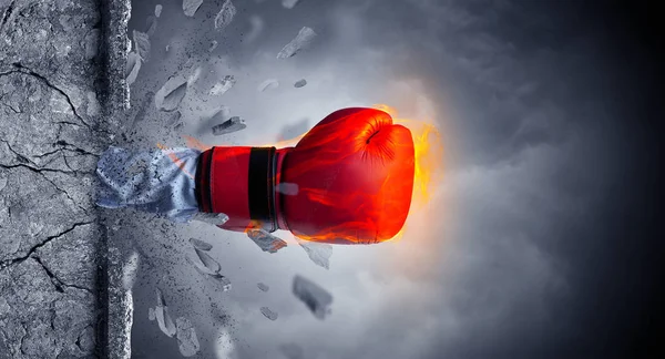 Hand hits intense and breaks stonewall — Stock Photo © ra2studio #224681322