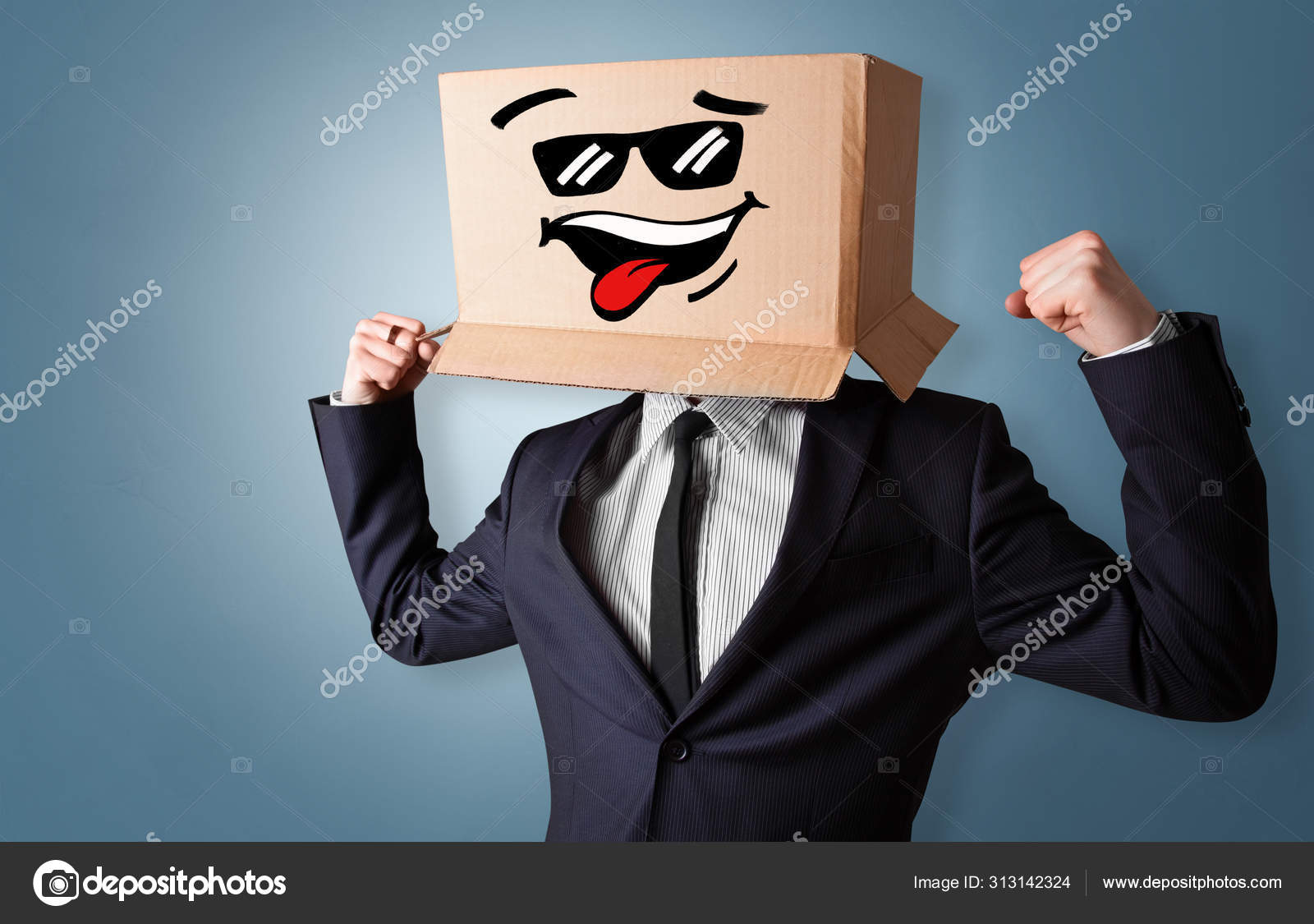 Young boy with happy cardboard box face Stock Photo by ©ra2studio 313142324