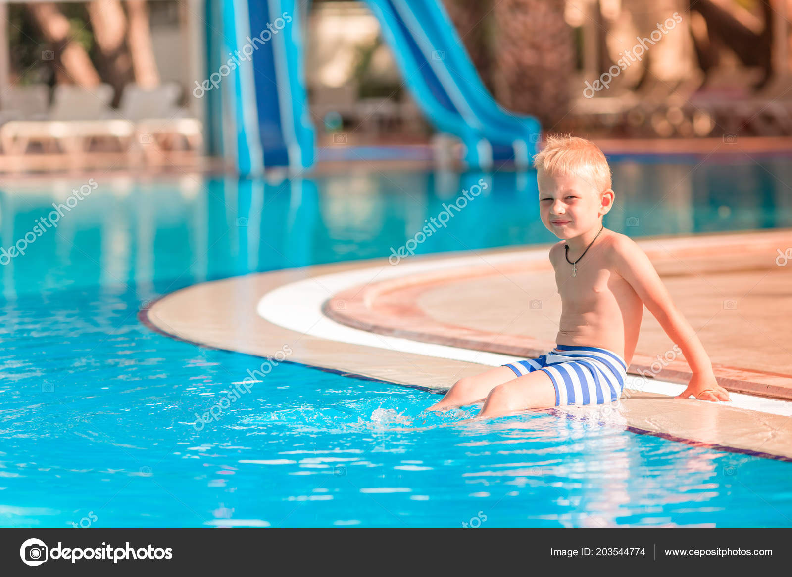 Cute Little Boy Sitting Pool Edge Stock Photo by ©Len44ik 203544774
