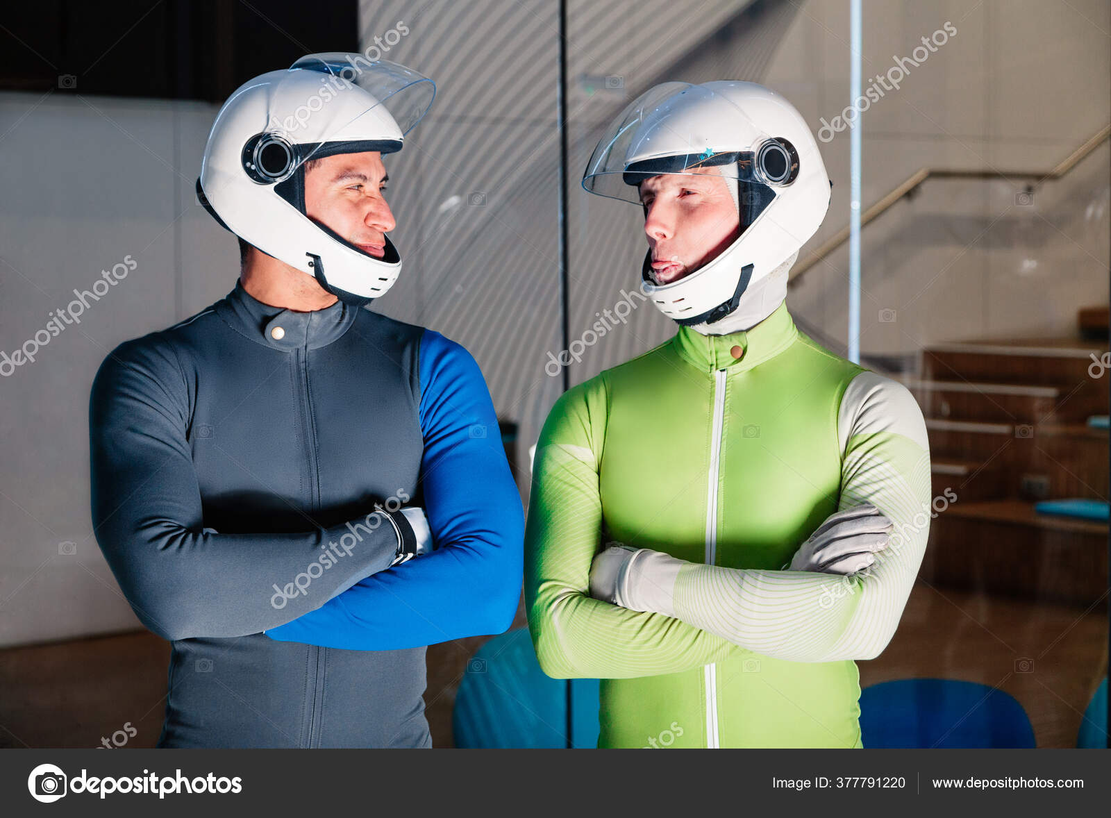 Two smiling flying men are prepared to fly in the wind tunnel. Stock ...