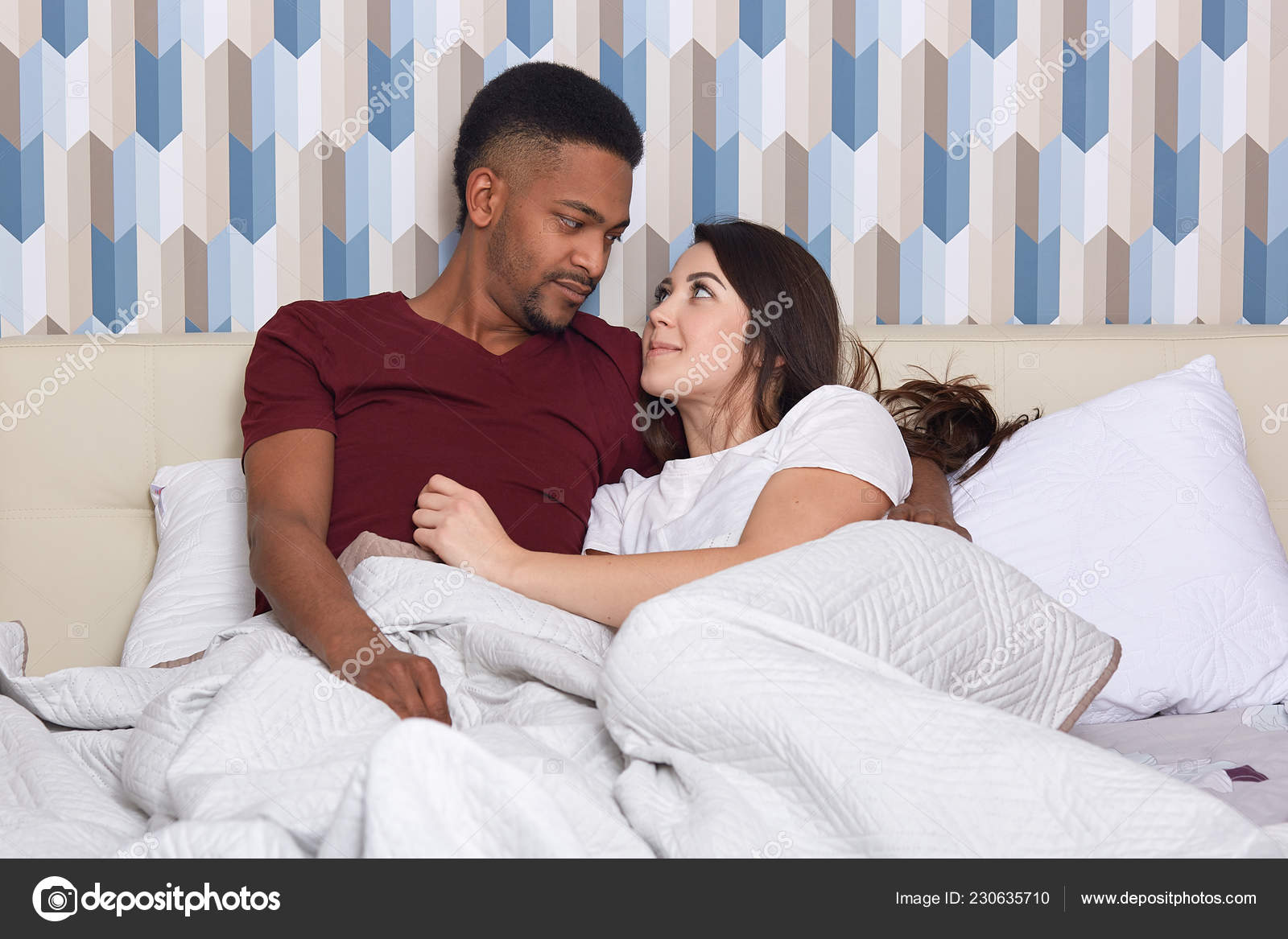 Photo Multiethnic Married Young Woman Man Cuddle Look Each Other ...