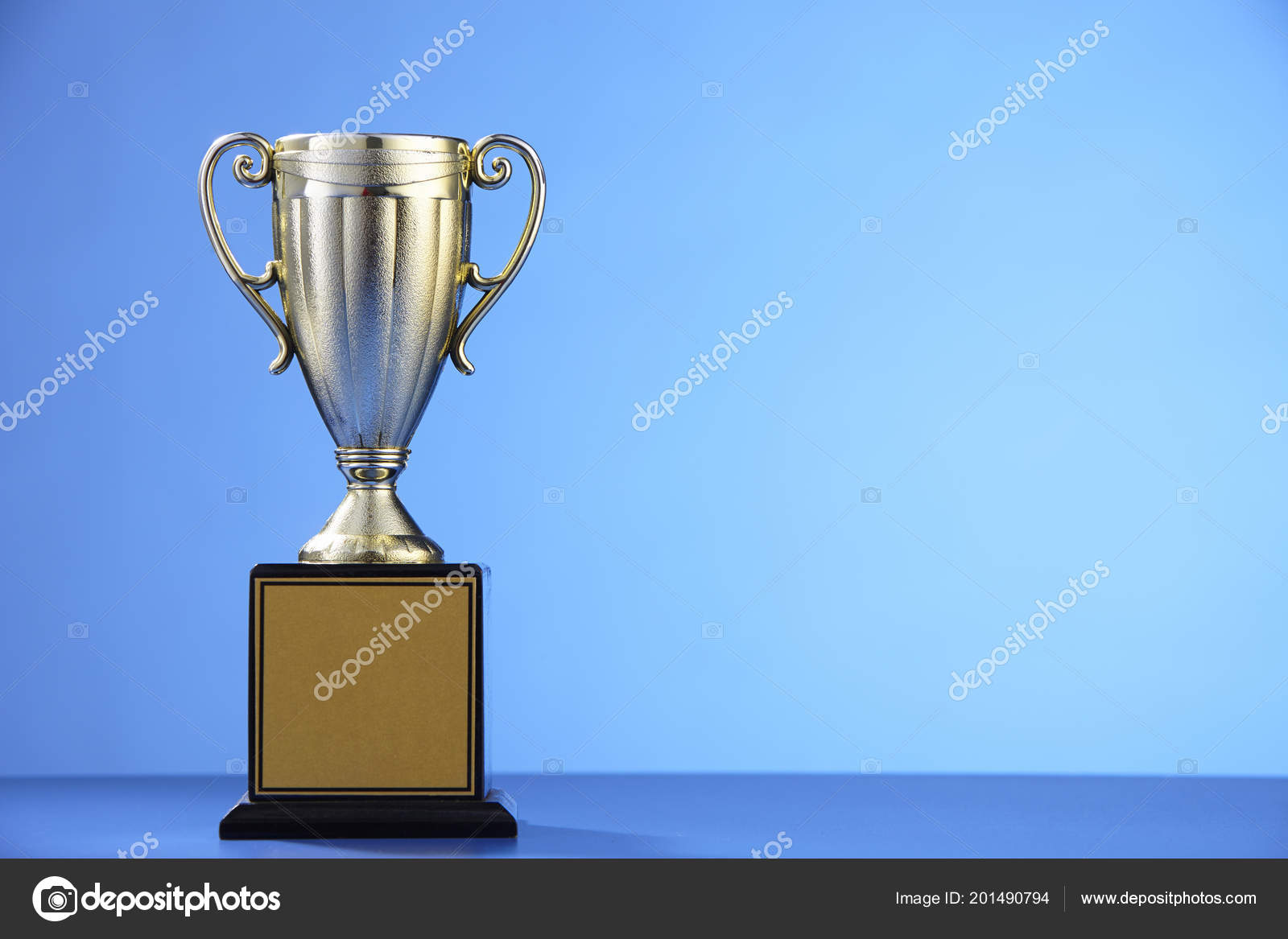 Golden Trophy Blue Background Stock Photo by ©eskaylim 201490794
