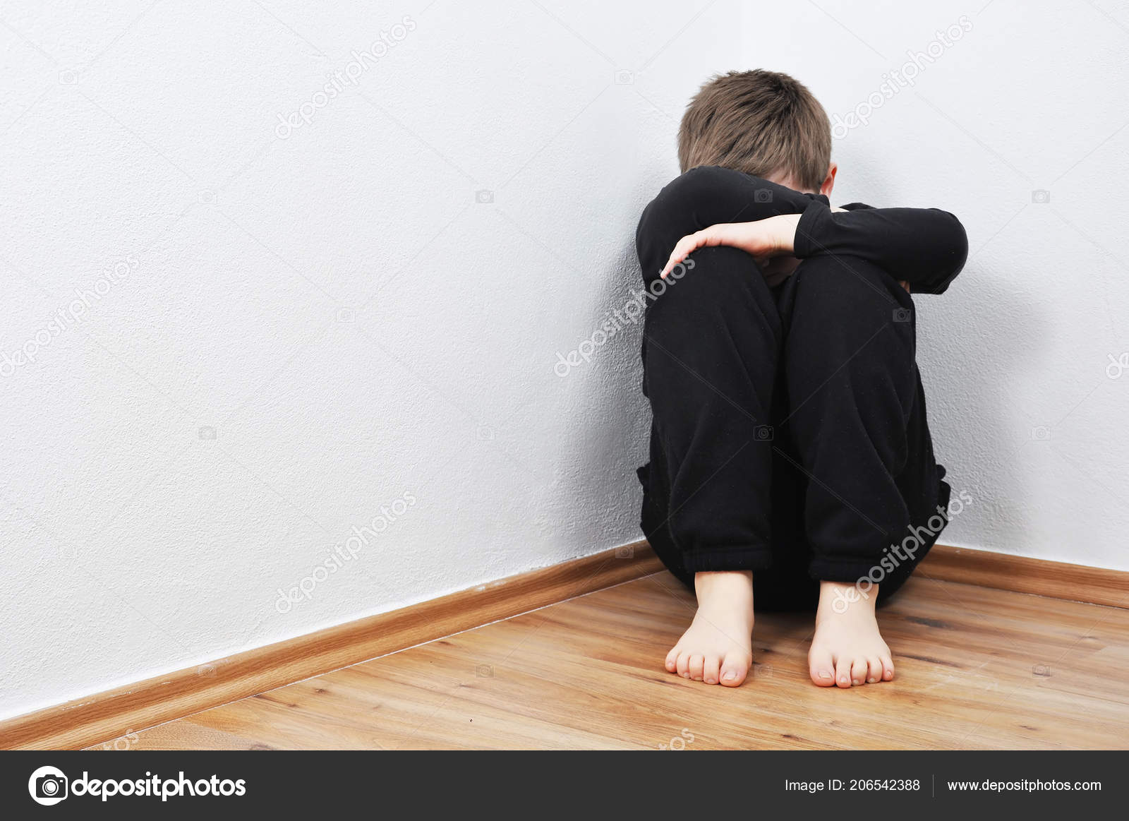 Child Crying In Corner