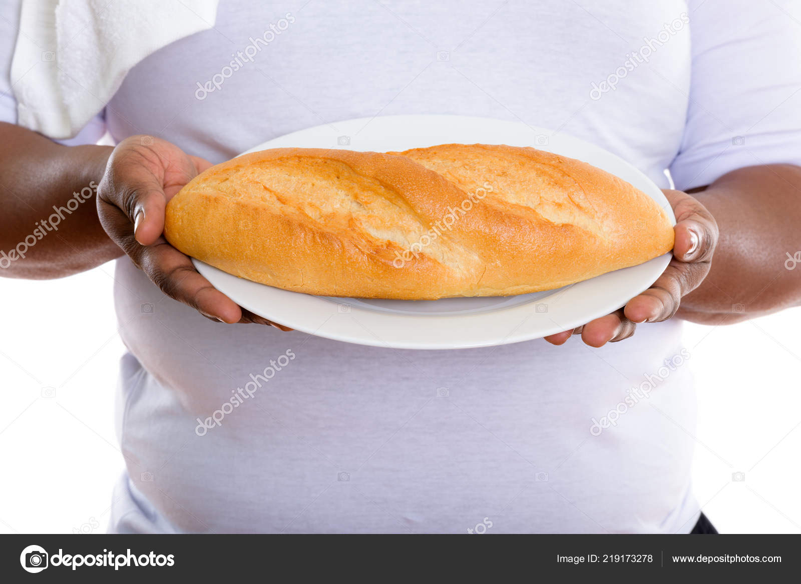 Studio shot of fat black African woman holding bread served on w Stock ...