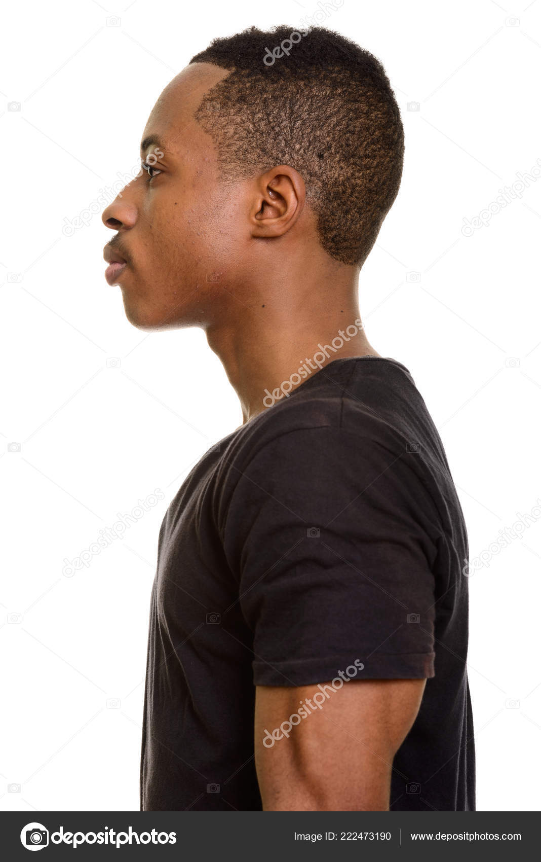 Profile view of young African man isolated against white background ...