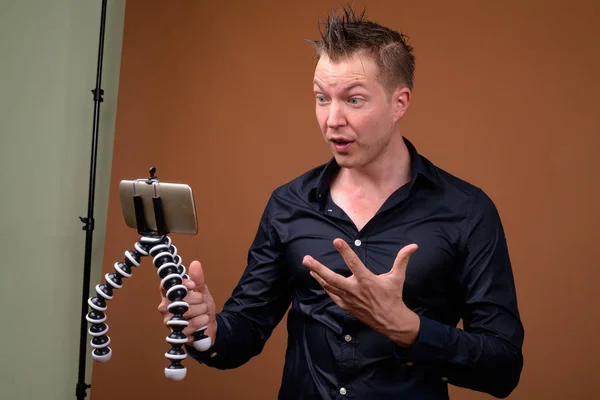 Young Asian Filipino man influencer vlogging in studio Stock Photo by ...