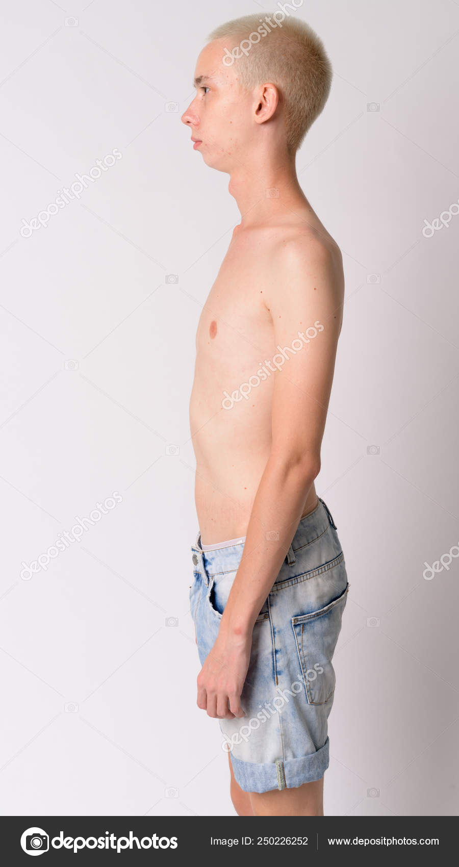 Profile view of young handsome androgynous man shirtless — Stock Photo ...