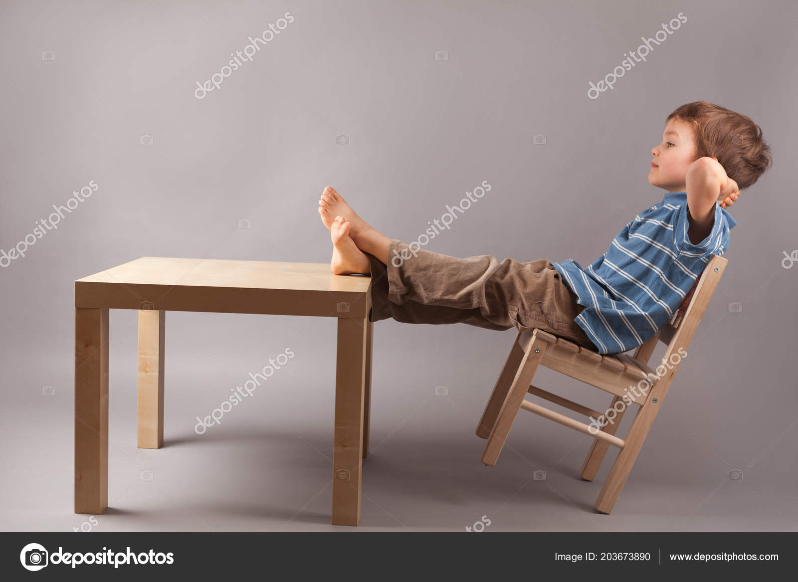 Portrait Little Boy Child Sitting Table Gray Background Stock Photo by ...
