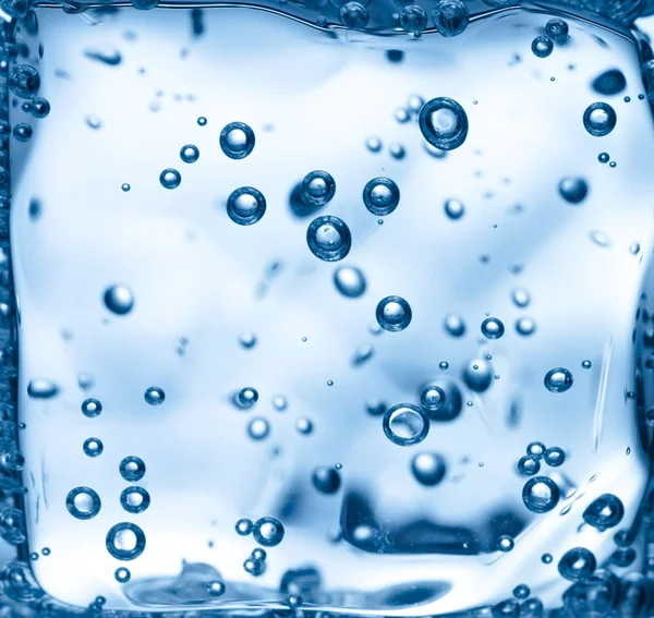 Ice cube splash in water cold — Stock Photo © PicsFive #249655908