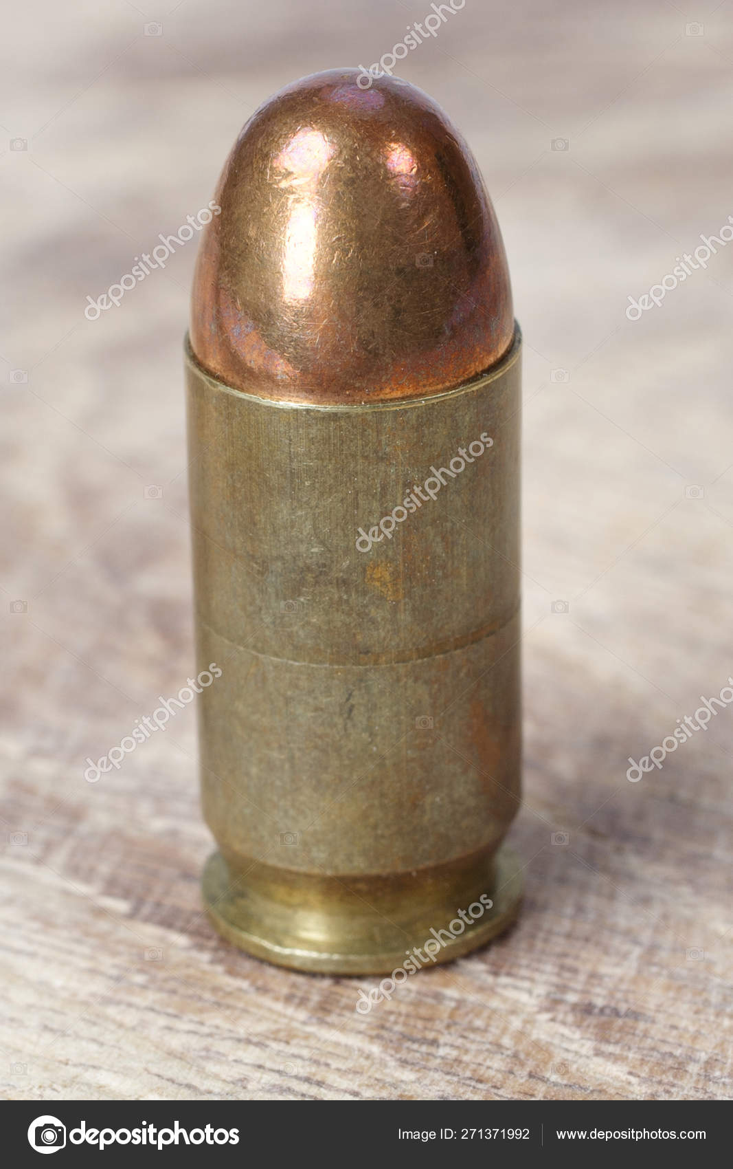 .45 ACP (Automatic Colt Pistol), or .45 Auto (11.43x23mm) a handgun ...