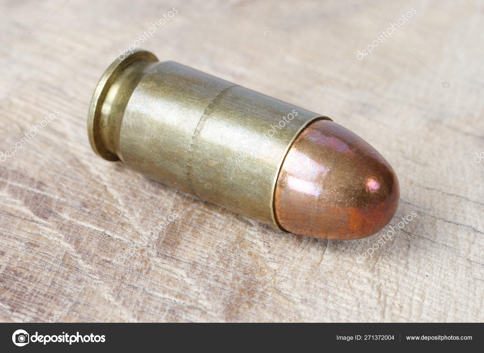 .45 ACP (Automatic Colt Pistol), or .45 Auto (11.43x23mm) a handgun ...