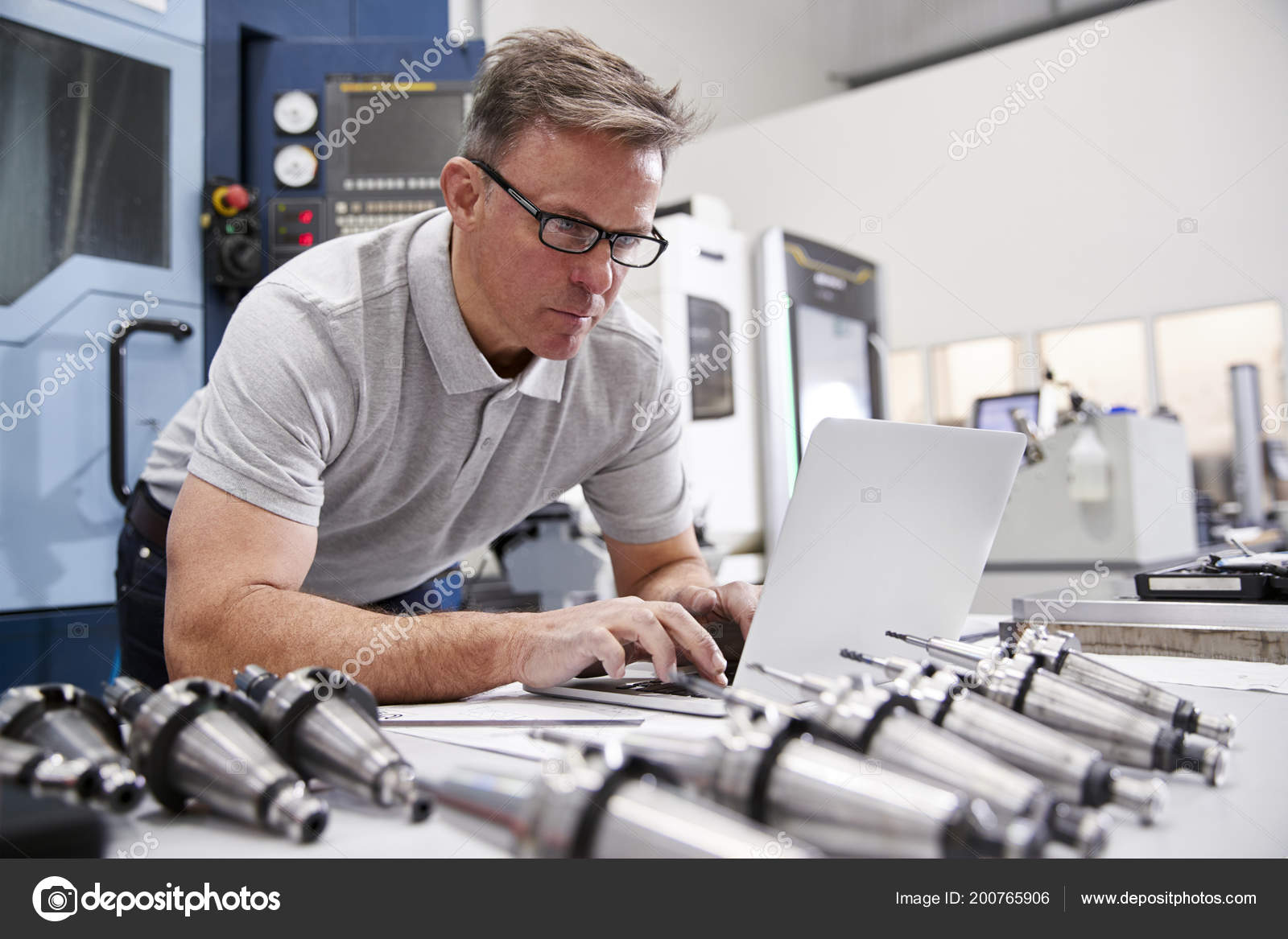 Male Engineer Using Cad Programming Software Laptop Stock Photo by ...