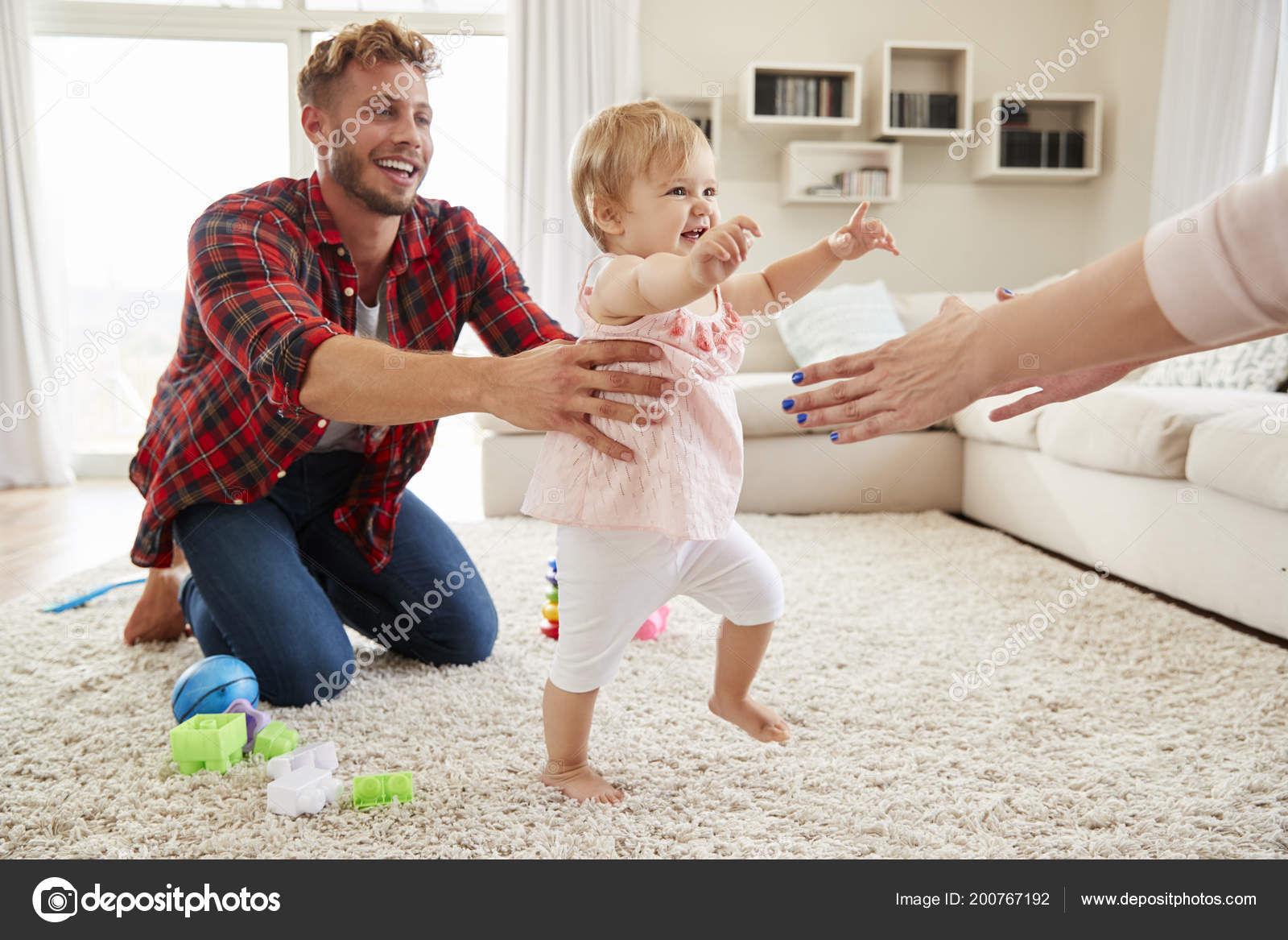 Girl Walking Dad Mums Arms Sitting Room Stock Photo by ©monkeybusiness ... Girl Walking Dad Mums Arms Sitting Room Stock Photo by ©monkeybusiness ...