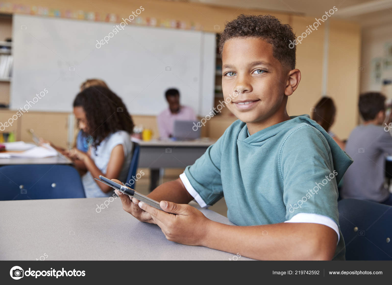 Boy Using Tablet School Class Smiling Camera Stock Photo by ...