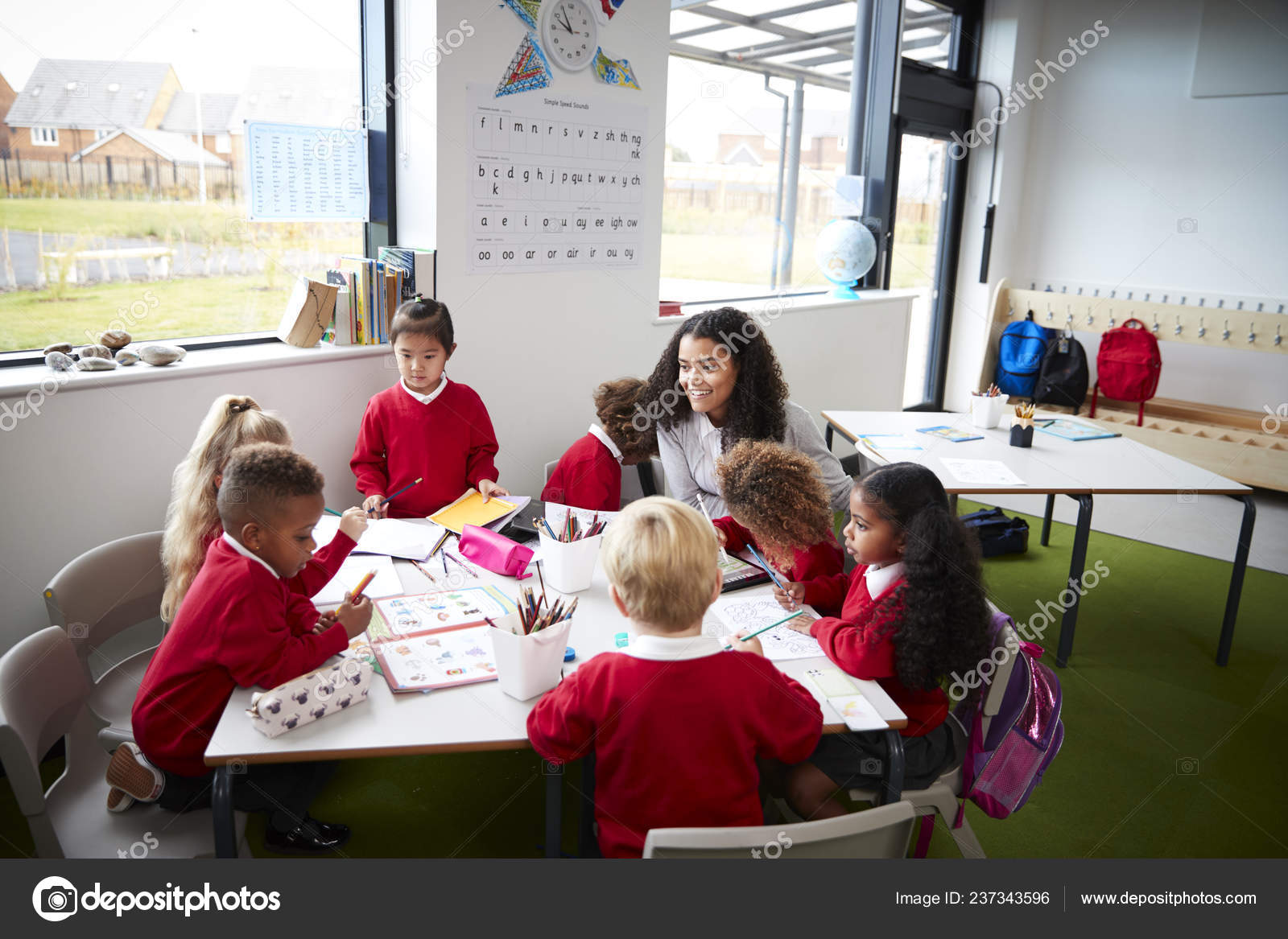 Group Infant School Kids Sitting Table Classroom Female Teacher — Stock ...