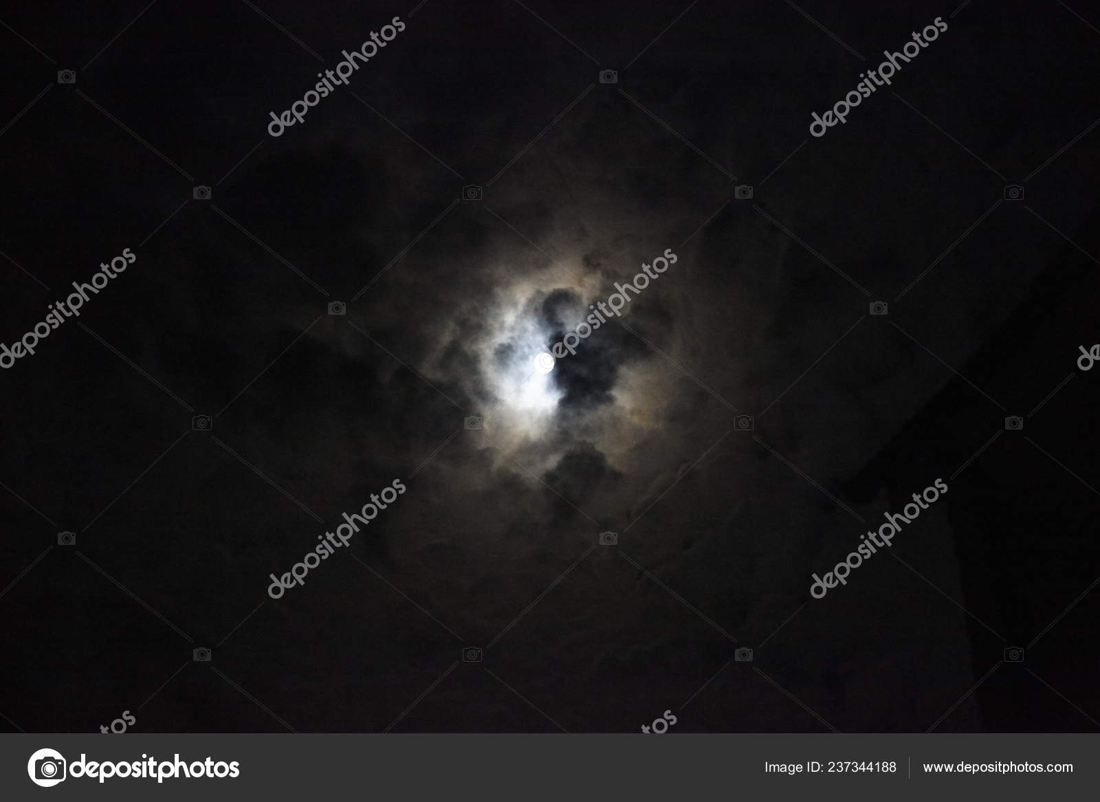 Full Moon Appearing Clouds Night Stock Photo by ©monkeybusiness 237344188