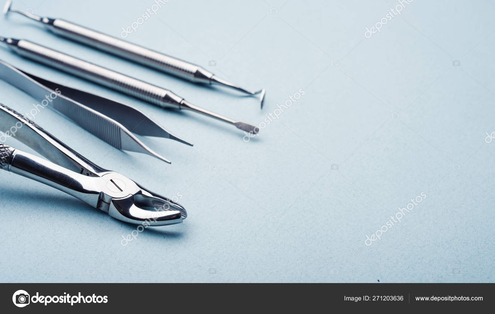 Dental steel instruments with copy space Stock Photo by ©GekaSkr 271203636