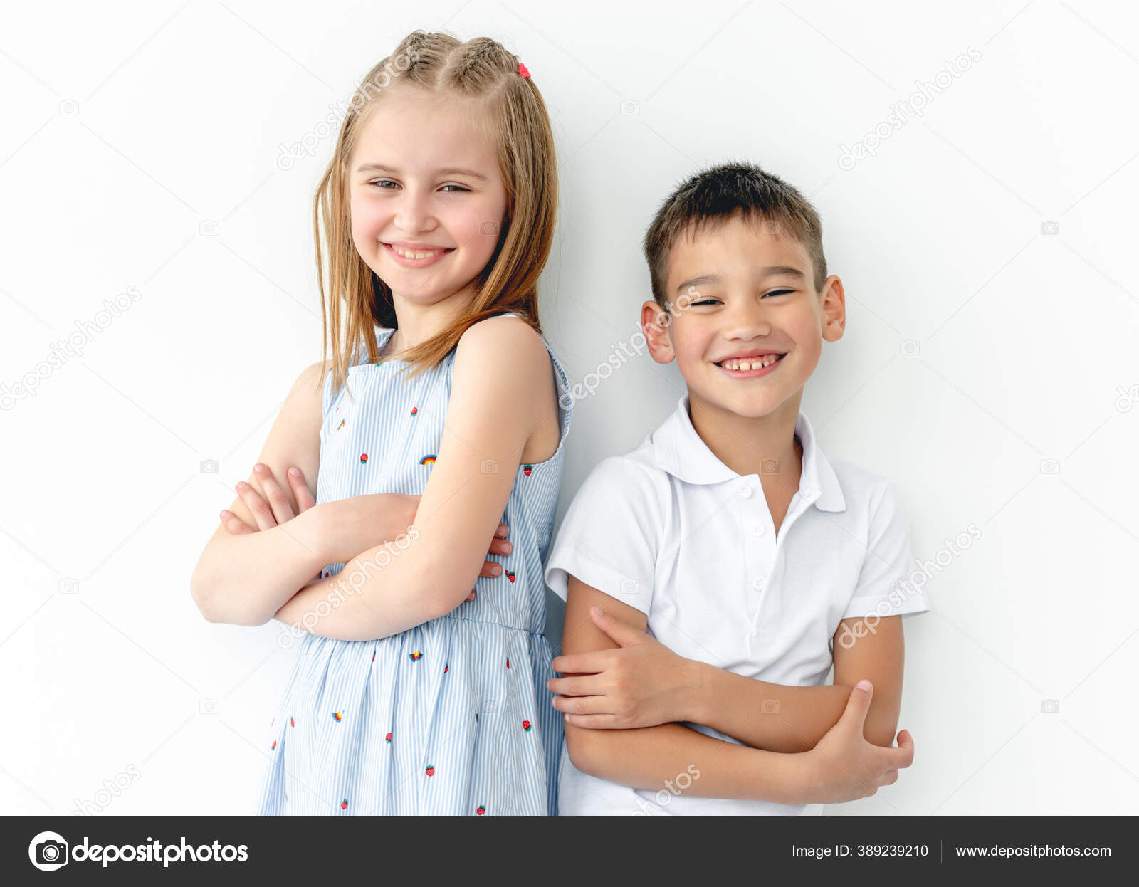 Happy children with crossed hands Stock Photo by ©GekaSkr 389239210