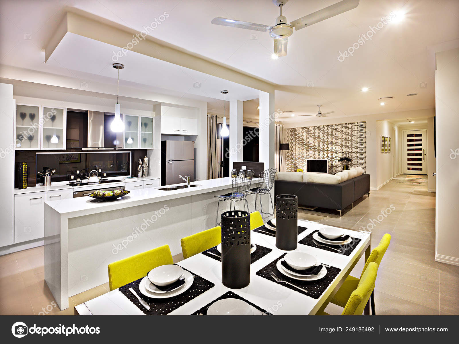 Modern kitchen interior illuminated with lights at night — Stock Photo ...