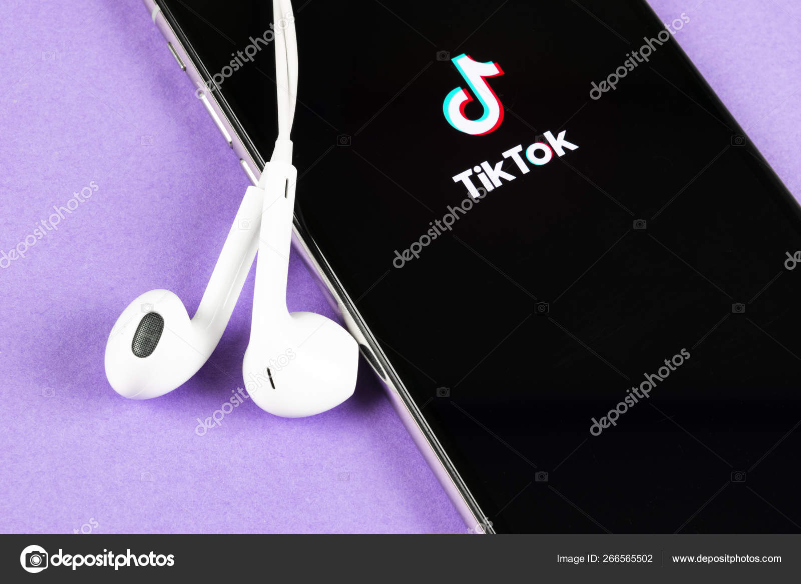 Tik Tok application icon on Apple iPhone X screen close-up. Tik Tok ...