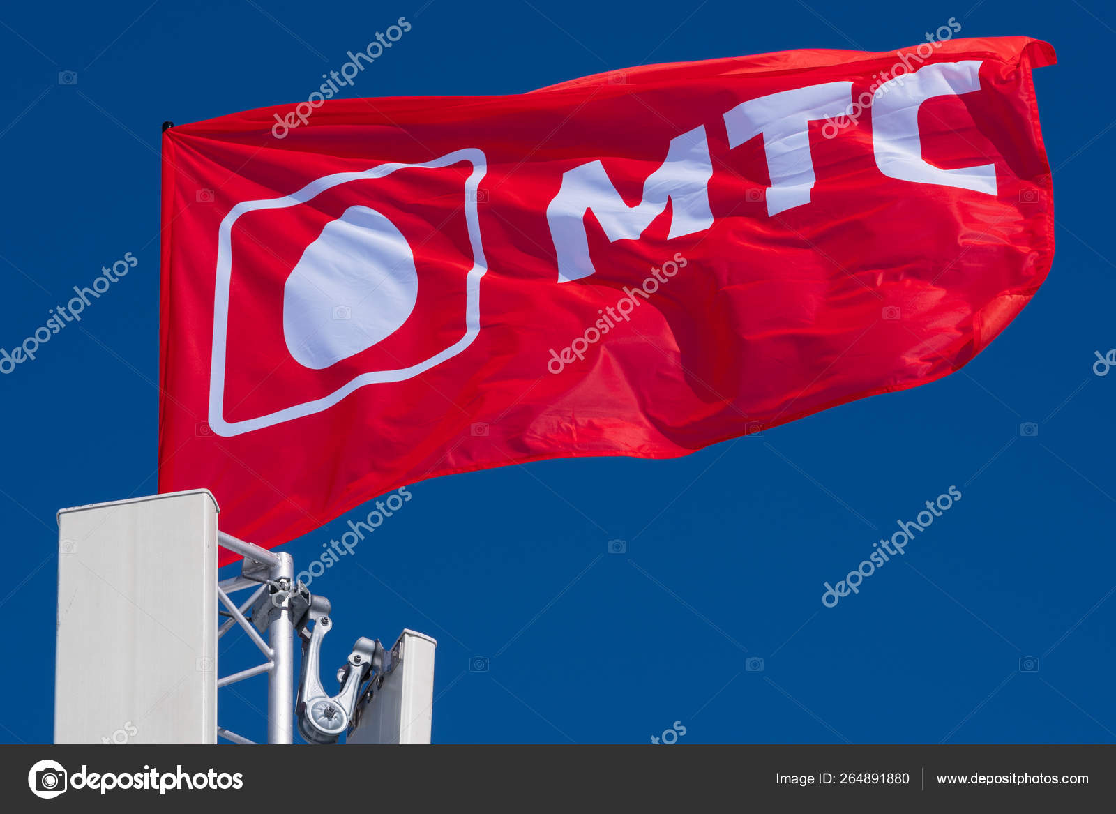 Flag with emblem, symbols of Mobile TeleSystems (MTS) - mobile operator ...