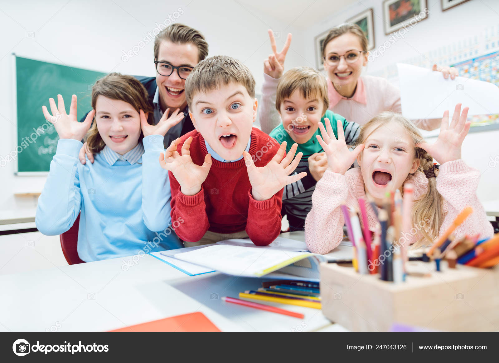 Funny class, students and teachers making faces — Stock Photo © Kzenon ...