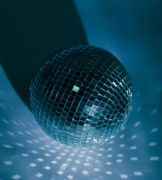 mirror ball.isolated on a dark background with blue backlight - Stock ...
