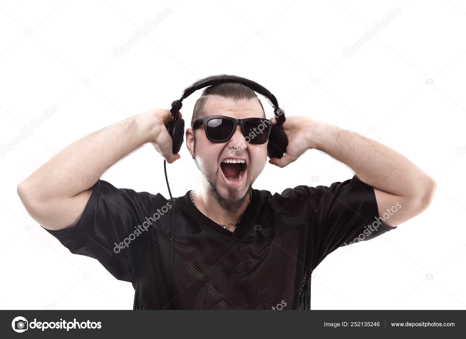 Close up. stylish rapper shows headphones .isolated on white — Stock ...