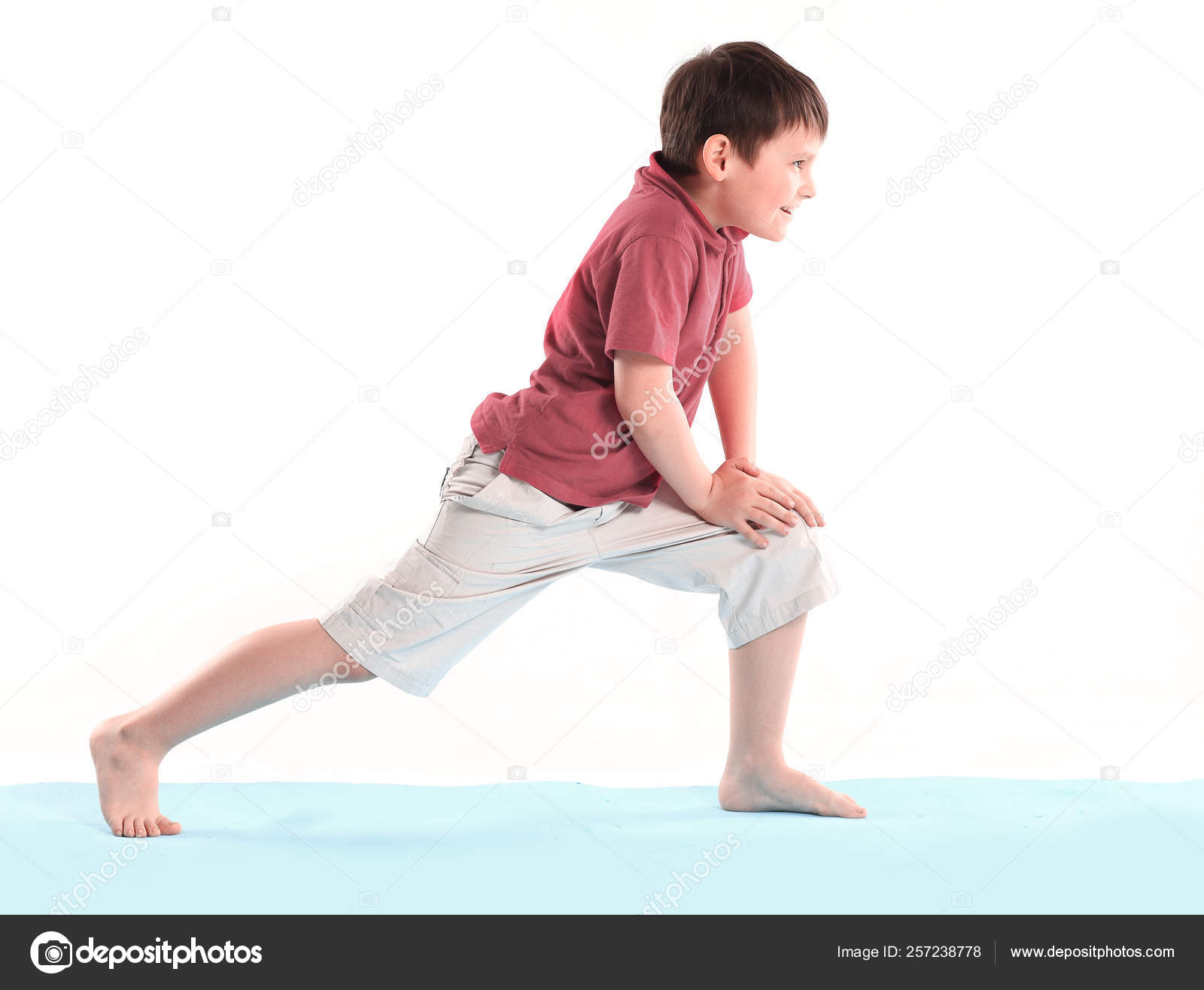 Little boy does morning exercises.isolated on white background Stock ...