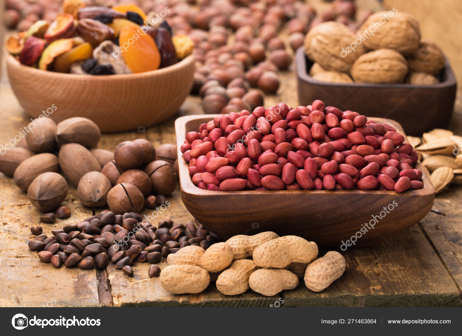 Peanut asian peeled in wooden bowl on table, grunge style. — Stock ...